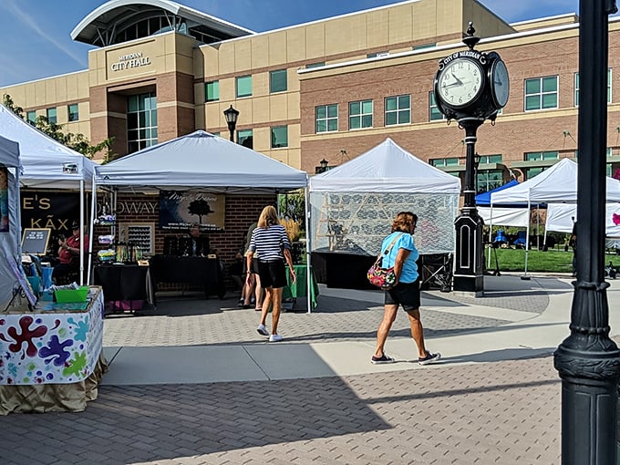 White tents bloom like flowers in the city square, creating a perfect outdoor shopping paradise.