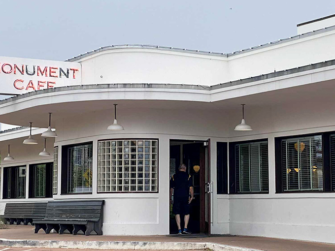 Georgetown's Monument Cafe stands proud with Art Deco curves that whisper tales of simpler breakfast times.