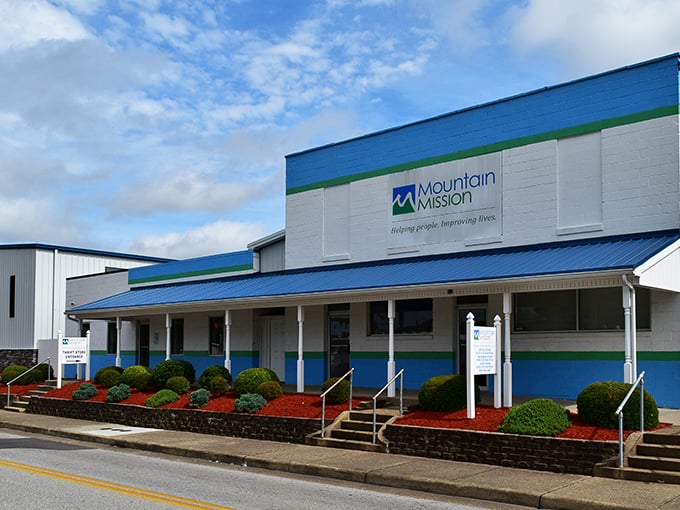 Mountain Mission's bright blue facade stands as a beacon of bargains. Inside this charitable powerhouse, your dollars stretch while helping the community.