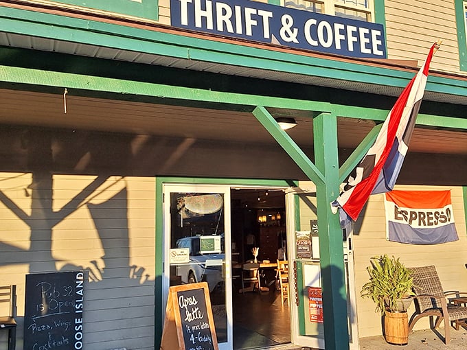 Mountain Thrift & Coffee: Where caffeine meets collectibles! This charming green-trimmed shop with colorful flags invites you to browse while sipping espresso.