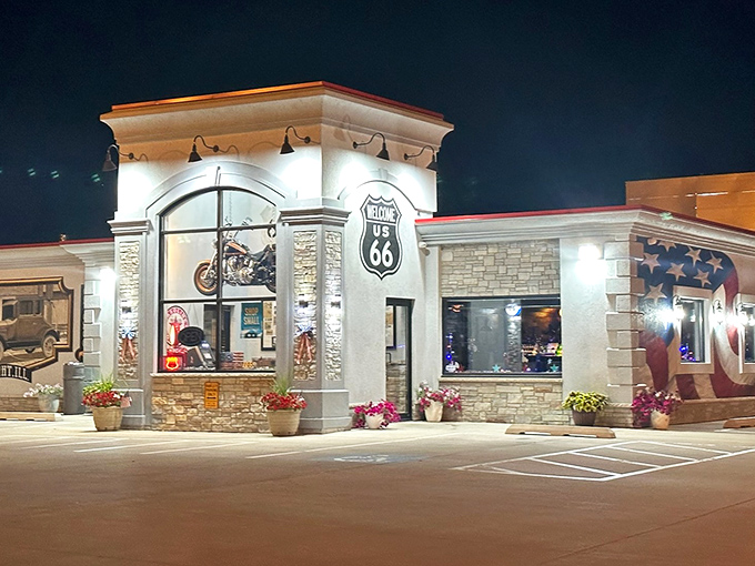 Route 66 dreams come alive at this stone-fronted time capsule, where neon glows and comfort food flows.