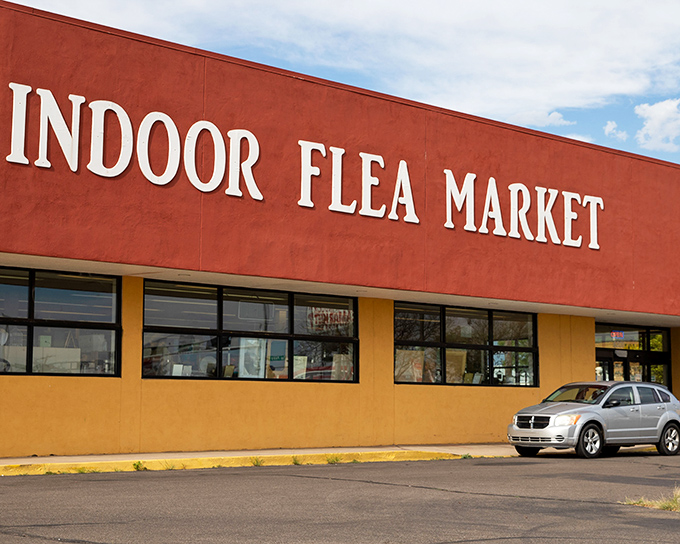 That red and yellow storefront promises climate-controlled treasure hunting - no dust storms allowed inside!