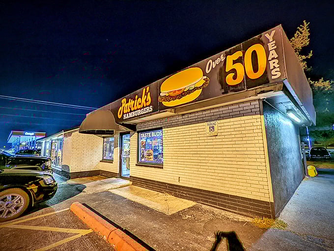 Patrick's neon burger sign glows like a beacon in the night, promising hand-crafted delights that would make fast food weep.