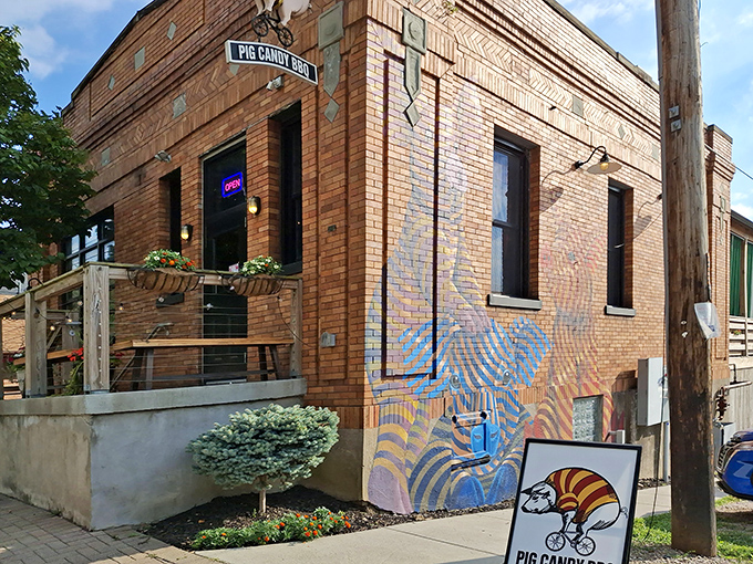 Brick walls and colorful murals create the perfect backdrop for Cincinnati's most creative BBQ adventure.