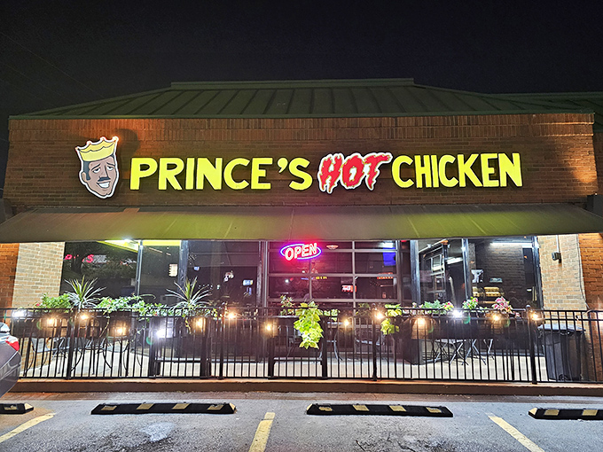 Prince's neon crown glows like a beacon for heat-seekers. The Nashville hot chicken revolution starts here!