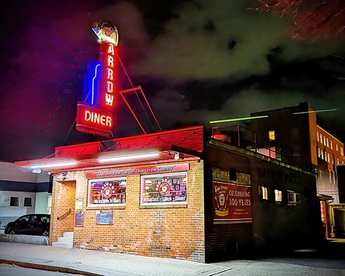 That iconic neon arrow points straight to breakfast heaven - a beacon for hungry souls seeking authentic diner magic.
