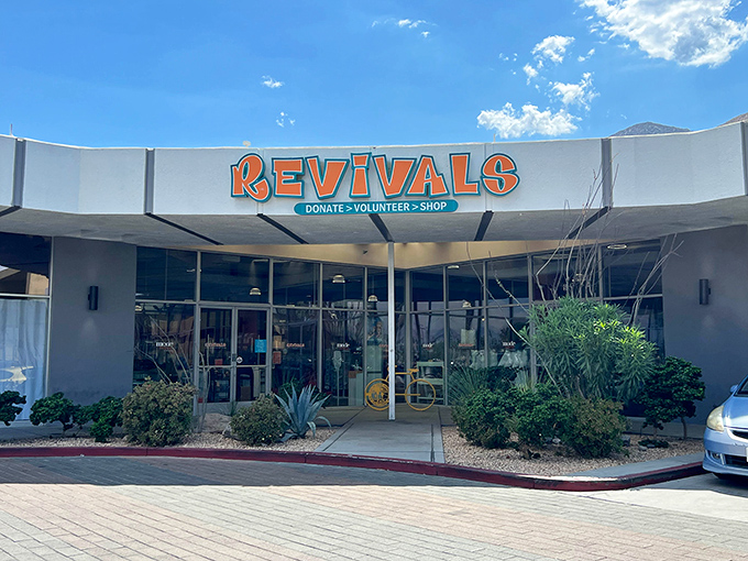 That retro curved entrance screams mid-century cool - Revivals knows how to make thrift shopping feel like stepping back in time.