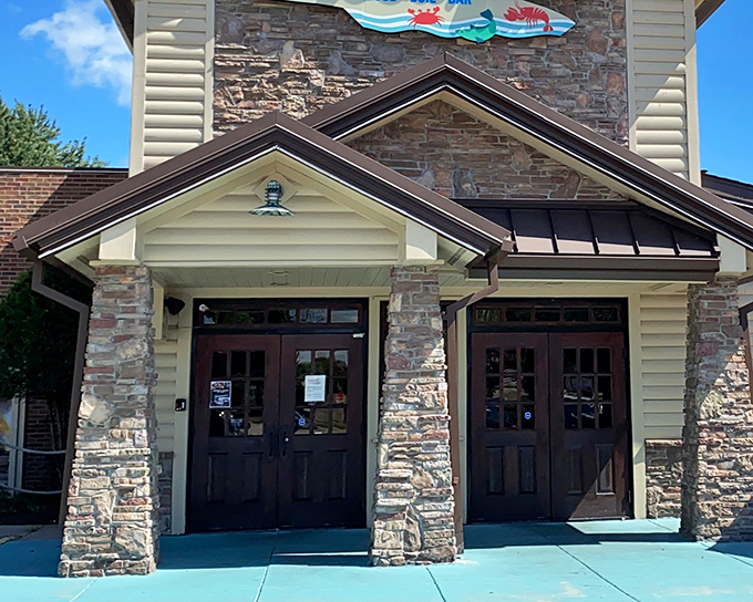 Seafood Island's stone facade hides a coastal getaway where that seafood sign promises underwater delights without the sunburn.