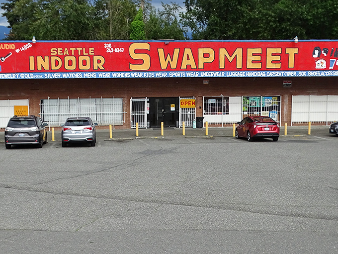 The unmistakable red facade of Seattle Indoor Swap Meet promises climate-controlled treasure hunting. Rain or shine, the bargains are fine!