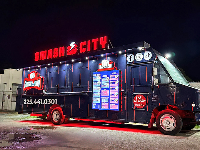 This food truck glows like Vegas at night, a neon beacon for serious hot dog enthusiasts.