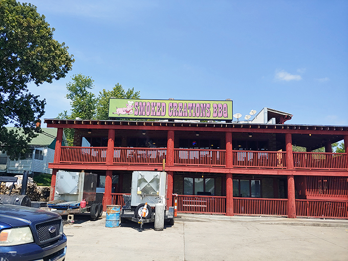 Smoked Creations' two-story red deck welcomes hungry visitors. This BBQ playground is where serious meat meets serious fun.