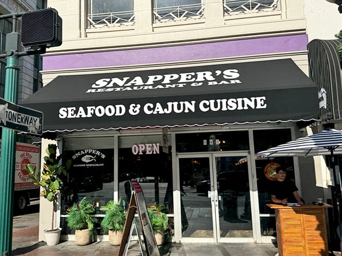 Snapper's bold awning promises bold flavors. Like finding the French Quarter's seafood soul in one convenient location.