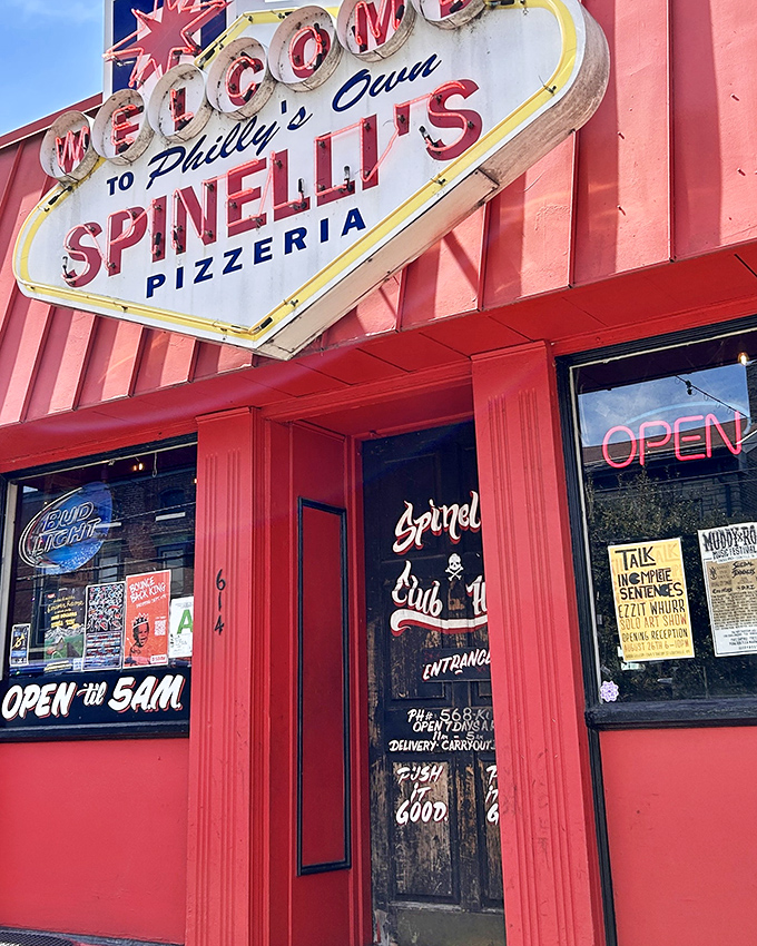 That vintage sign! Spinelli's wears its history like a badge of cheesy, saucy honor.