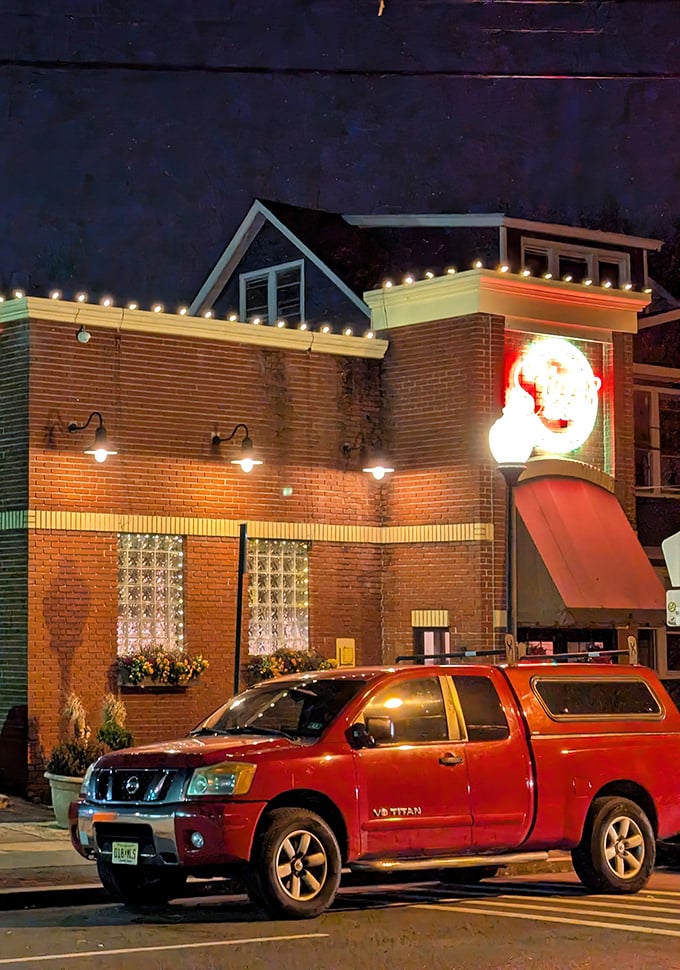 Star Tavern's brick facade glows like a beacon for bar pie aficionados. This Orange institution proves great pizza doesn't need fancy digs.