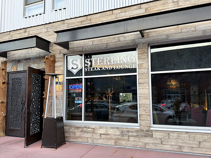 Sterling Steak & Lounge's stone exterior says "mountain sophistication." Like a ski lodge that graduated with honors in meat science.