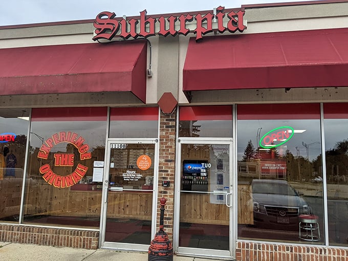 Red awnings and brick walls whisper promises of comfort food that'll make your day brighter.