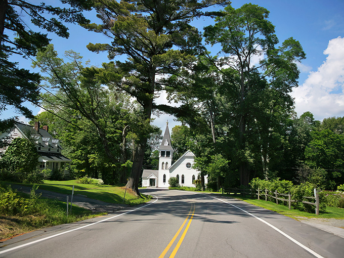 Sometimes the most beautiful destinations require nothing more than following a winding road toward a perfect white steeple.