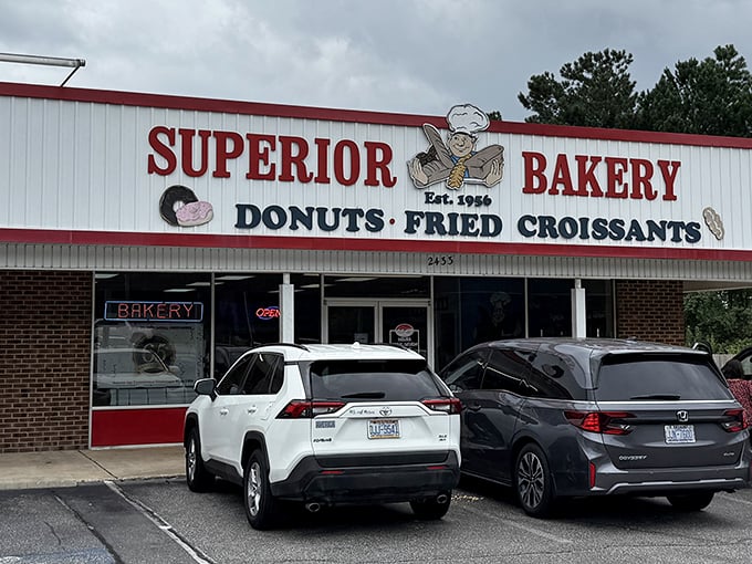 Superior Bakery's red and white fa&ccedil;ade promises fried delights that live up to the bold name. That chef logo knows what's up!