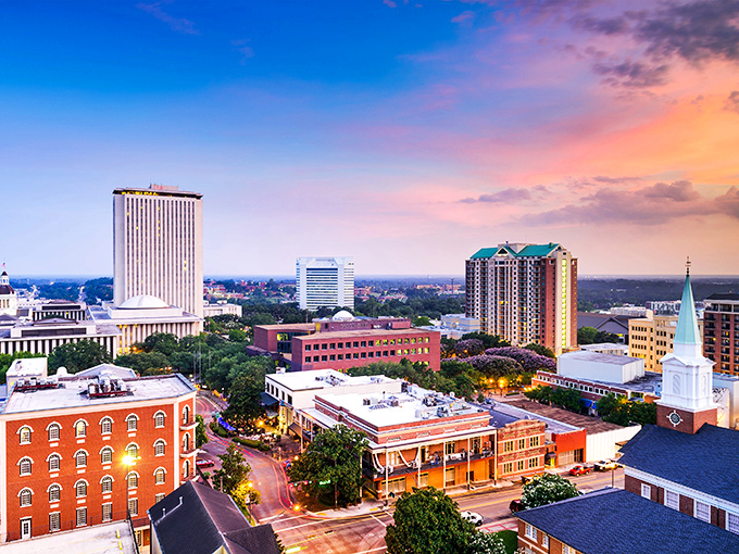 Tallahassee's skyline at sunset&mdash;where Southern charm meets capital city convenience without emptying your retirement fund.