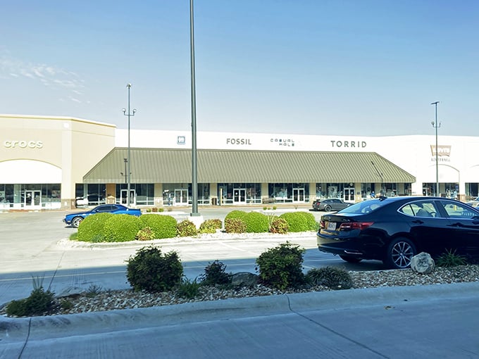 Tanger Outlets Branson showcases brands like Fossil and Torrid under the bright Missouri sky. Shopping paradise with no palm trees required!