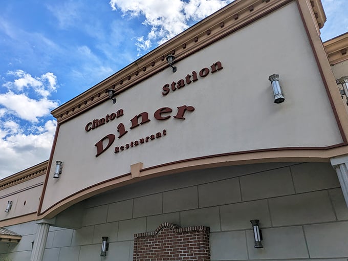 Clinton Station Diner's sign promises what every breakfast lover seeks: comfort food served with a side of small-town charm.