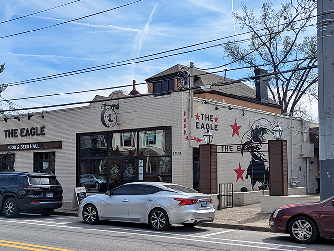 The Eagle's crisp white exterior hides a fried chicken paradise within. That eagle mural isn't just art&mdash;it's a taste promise.