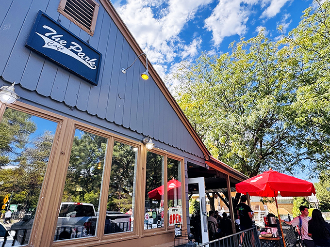 The Park Caf&eacute;&rsquo;s gray gable looks like it escaped from a storybook. Those red umbrellas aren't just for show&mdash;they're invitations.
