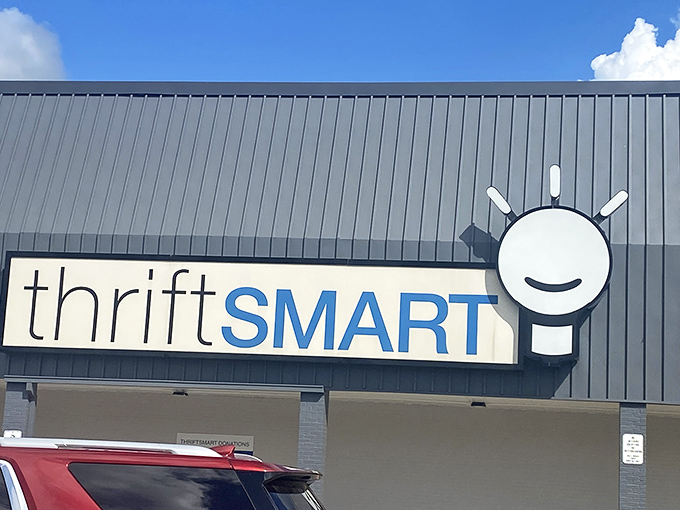 ThriftSmart's cheerful lightbulb logo is like a cartoon character saying, "Bright ideas and brighter bargains inside!"