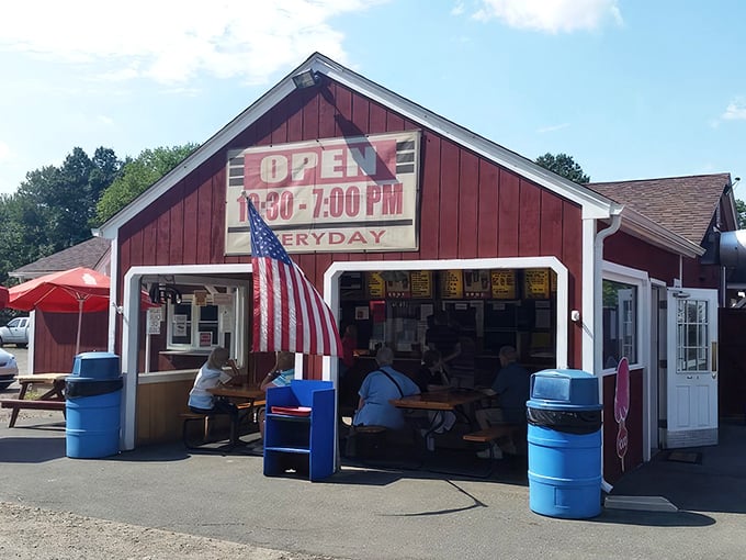 This little red shack with its proud American flag is where summer memories are made, one foot-long at a time.