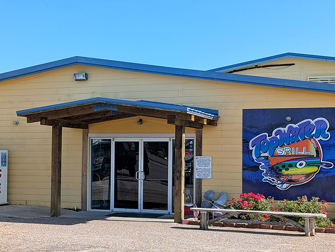 Topwater Grill's sunny yellow exterior welcomes hungry seafood lovers to this dockside gem in San Leon.