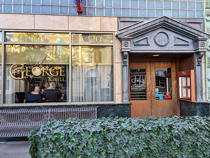 Triple George's elegant entrance feels like stepping into a bygone era where martinis flow and steaks sizzle.