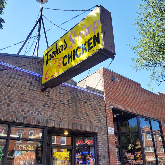 That yellow sign glows like a beacon of hope for anyone craving perfectly fried shrimp and chicken.