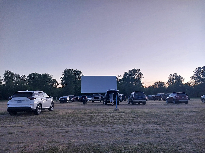Dusk settles over US 23 Drive-In as cars find their spots. The anticipation builds with every dimming ray of sunlight.