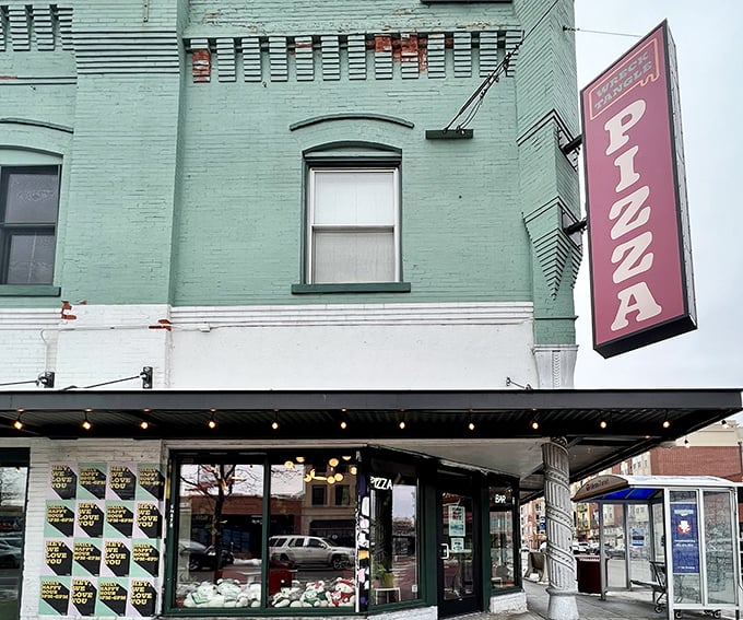 Wrecktangle's mint-green building houses pizza treasures within &ndash; the unassuming exterior hiding Detroit-style magic inside.