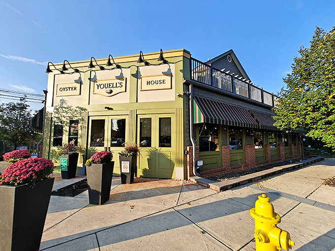 Youell's Oyster House glows with inviting charm, those flower pots practically whispering "come in for seafood!"