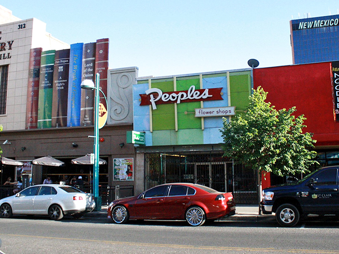 "People's Flower Shop" blooms amid Albuquerque's urban landscape, a reminder that beauty thrives even in the desert city.