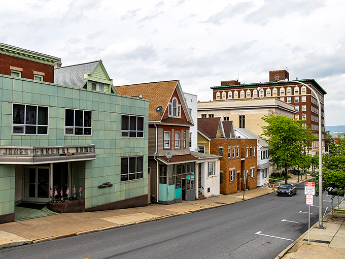 These storefronts whisper stories of Saturday shopping trips when downtown was the only game in town.