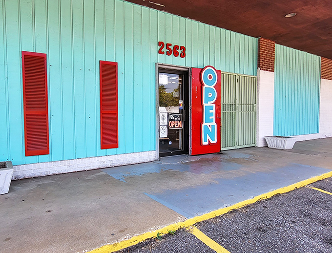 That cheerful turquoise exterior practically shouts "come explore!" - and who are we to argue with such enthusiasm?