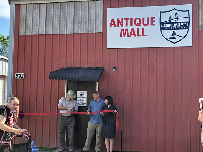 That ribbon-cutting moment when dreams become reality - every antique lover's heart skips a beat seeing this scene.