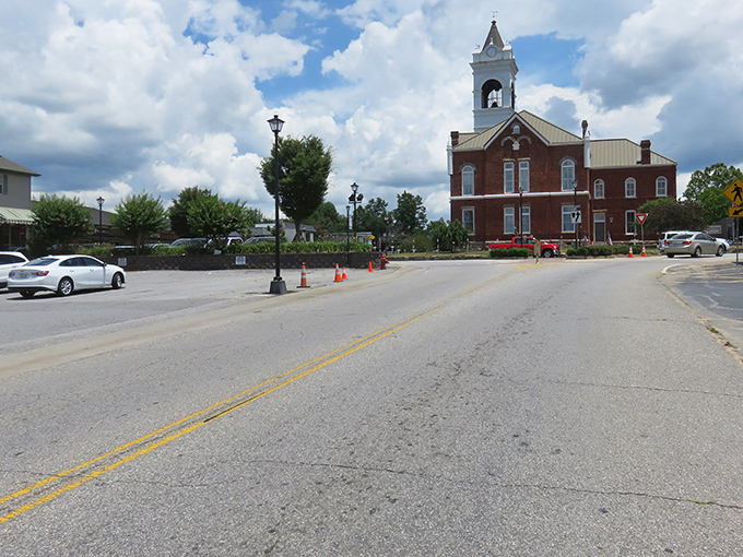 Blairsville's historic courthouse watches over time itself, a red-brick sentinel where locals still settle disputes with handshakes instead of lawyers.