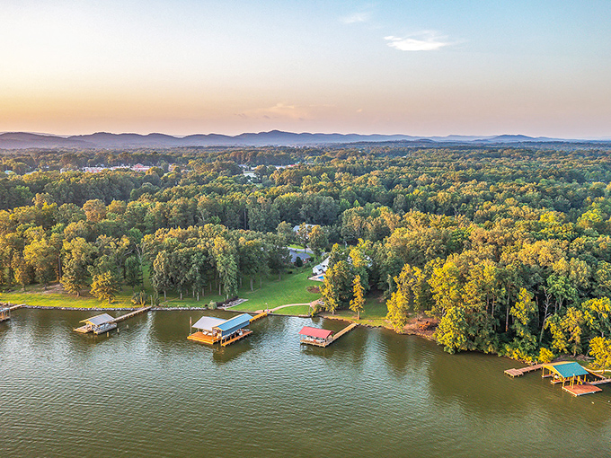 Boat houses with personality! Cedar Bluff's colorful docks stand like friendly neighbors, waving hello as the golden hour paints everything in wealth.