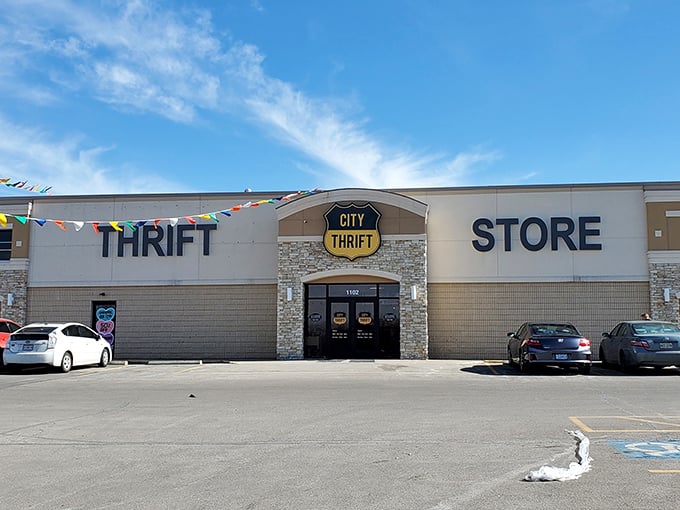 Bright blue skies frame this thrifting palace where your $20 transforms into a shopping spree. The stone facade adds a touch of retail royalty.