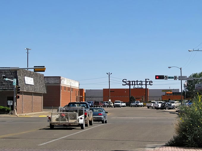 Red light special! Santa Fe Plaza in Clovis offers small-town prices that would make big-city shoppers slam on their brakes faster than these waiting vehicles.