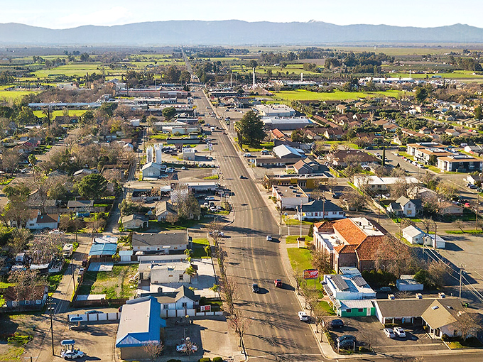 Main Street stretches toward mountains like your Social Security check stretches toward month's end!
