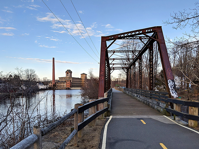 Rust meets reflection! This bridge path invites you to cross into Coventry's industrial past&mdash;like stepping into a Springsteen song about working-class dreams.