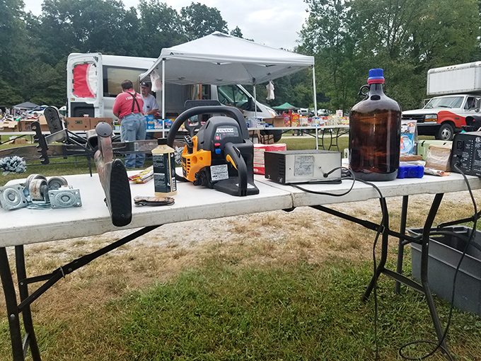 Vintage tools and mysterious bottles create the perfect recipe for nostalgic browsing under summer skies.
