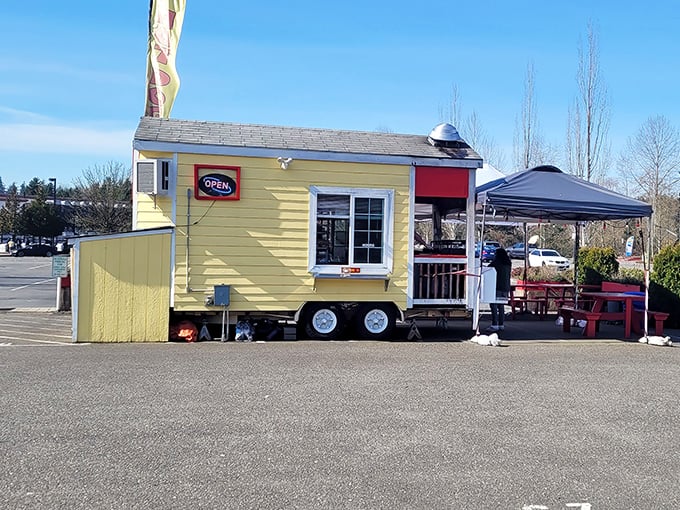 Red picnic tables and good vibes create the perfect recipe for outdoor dining bliss.