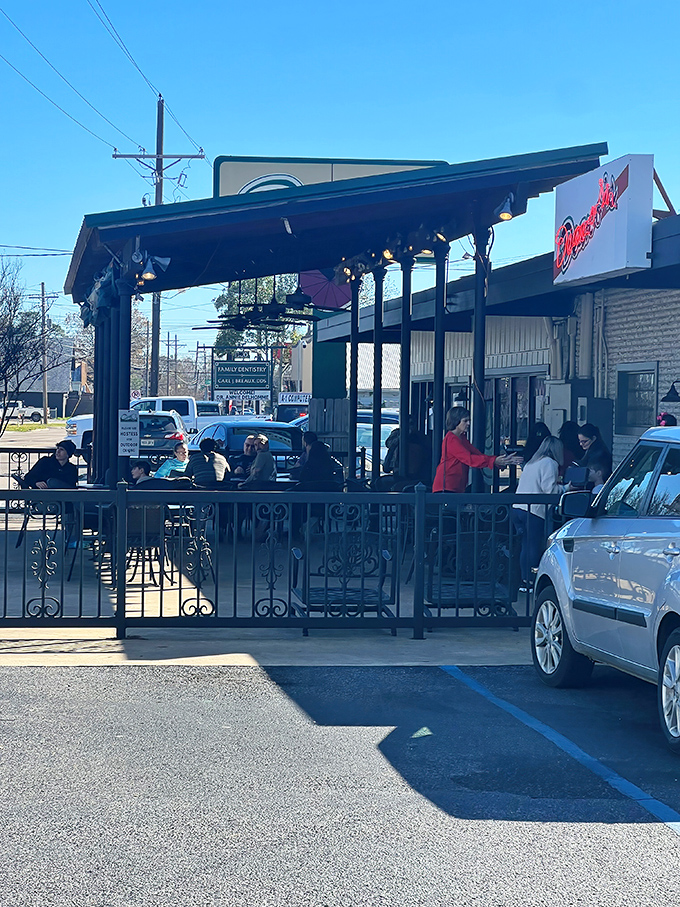 Deano's outdoor patio invites you to enjoy that perfect cheese pull while soaking up some Louisiana sunshine.