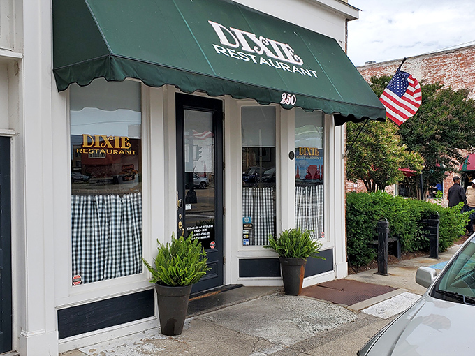 Those gingham curtains promise the kind of meal that makes you loosen your belt buckle. 