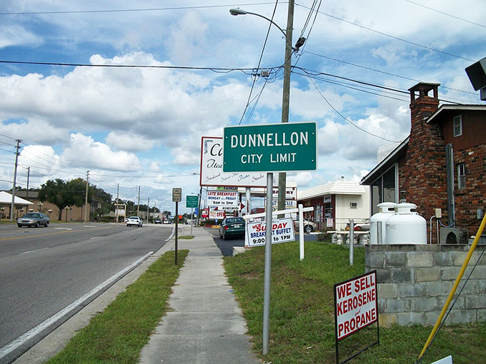 The "Dunnellon City Limit" sign might as well read "Your Social Security Goes Further Here" &ndash; simple living with river views included.